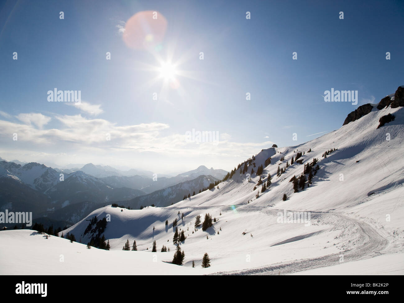 Way through snowy mountain landscape Stock Photo - Alamy