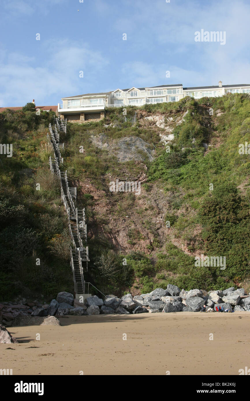 View taken from the beach showing the steep steps leading to the beach ...