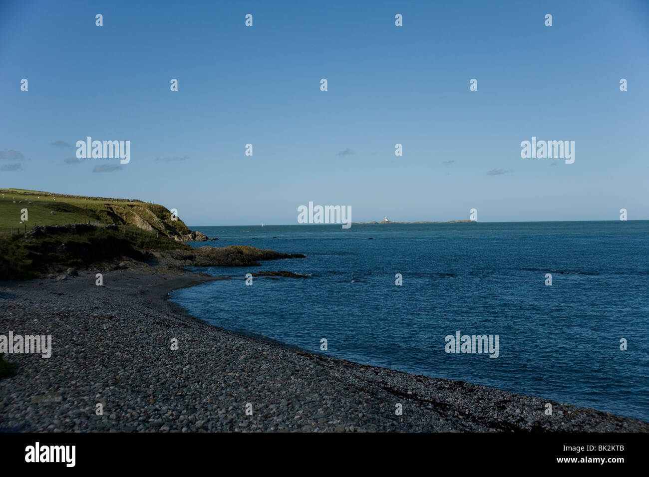 Skerries Lighthouse and Hen Borth bay from the Anglesey coastal path ...