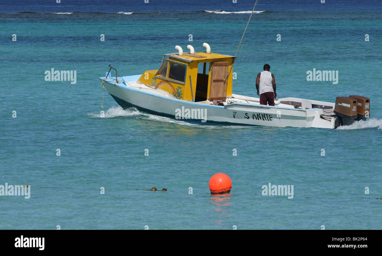 Fisher boat in Tobago Stock Photo - Alamy