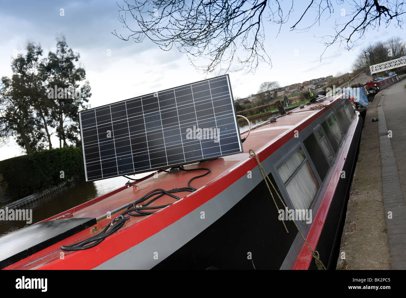 Solar panel supplying electricity aboard a canal narrowboat in Uk Stock ...