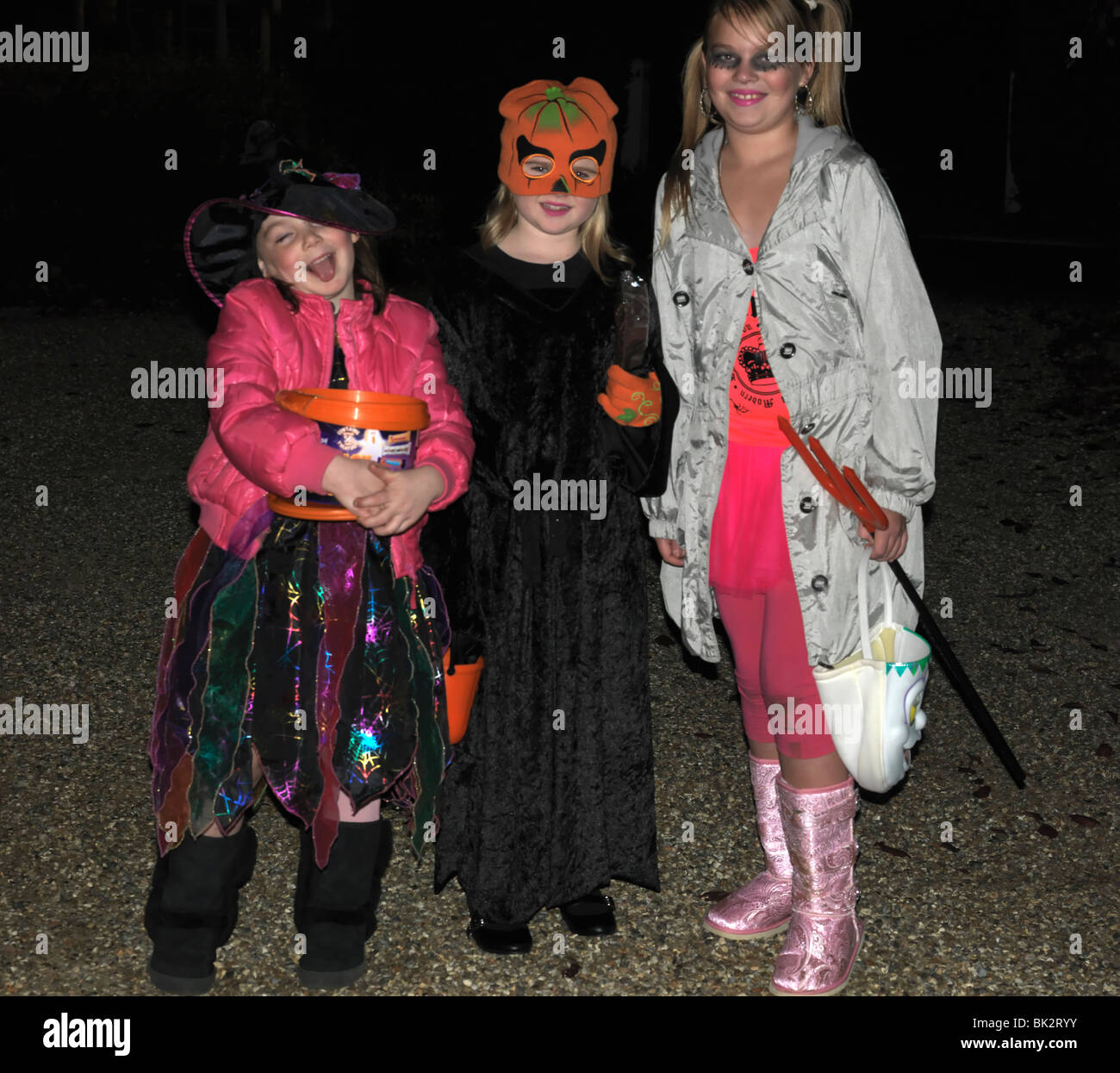 Halloween Trick Or Treating Children Dressed In Halloween Costume ...