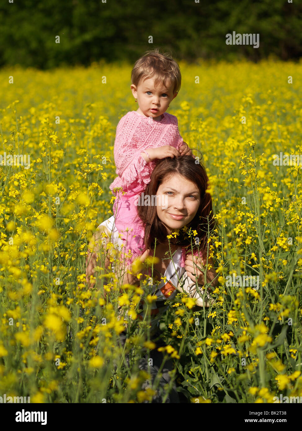 Mother with baby indoor Stock Photo - Alamy