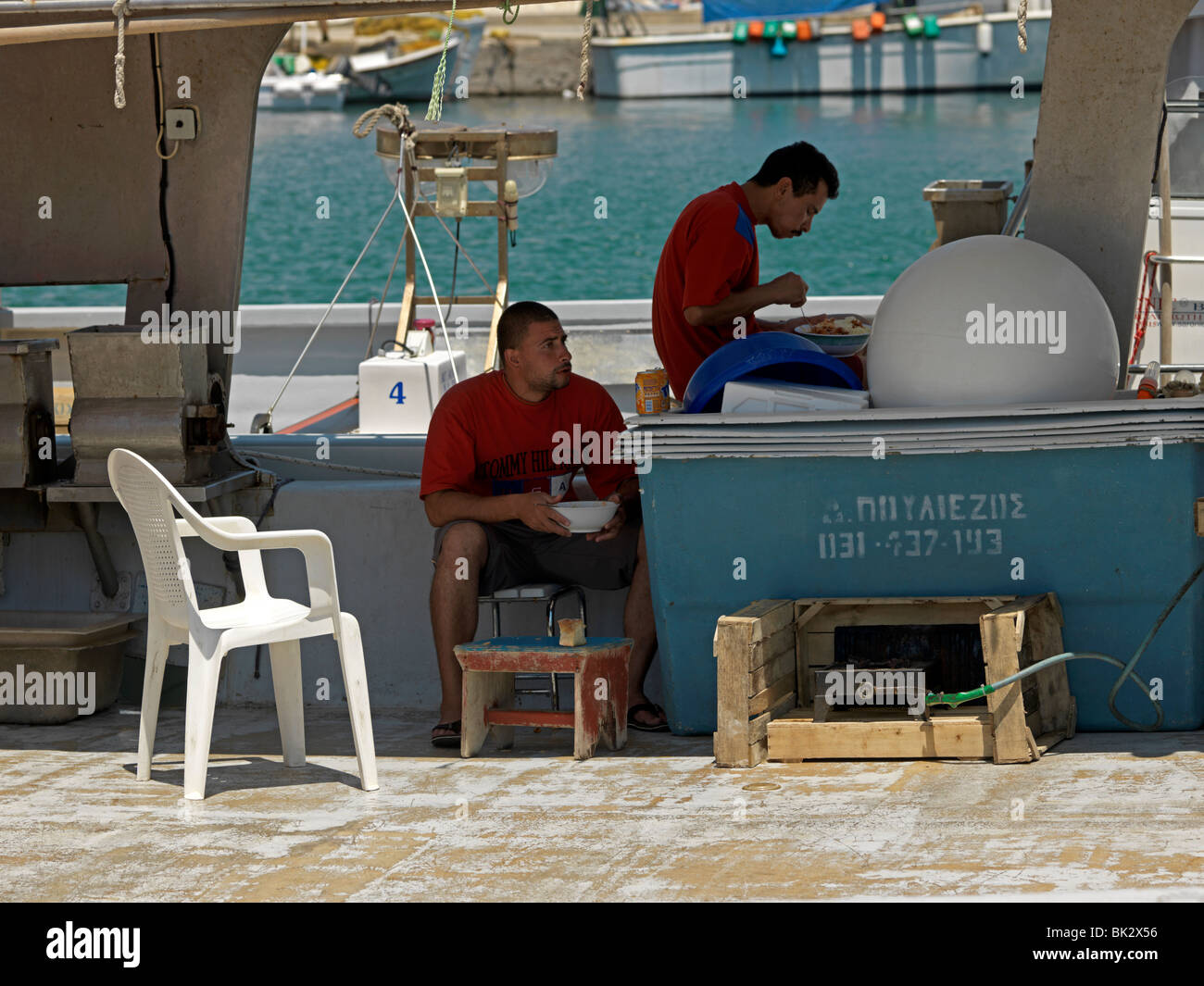 Fishermen Eating Lunch on Fishing Boats at the Port of Lavrio Attica ...
