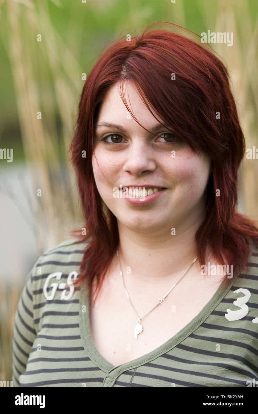 Headshot plus sized young woman posing Stock Photo - Alamy