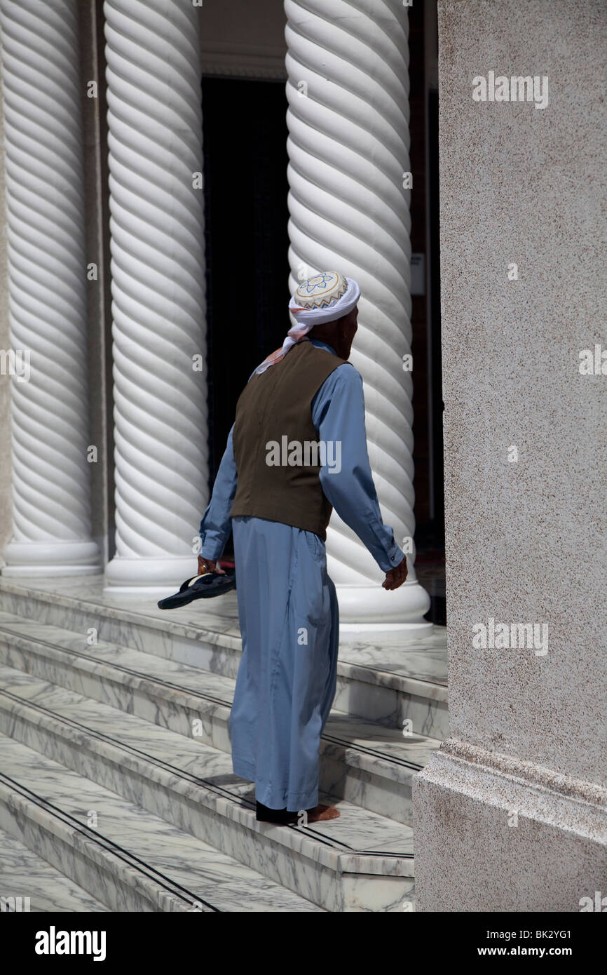 Man going into Mosque, Brunei Stock Photo - Alamy