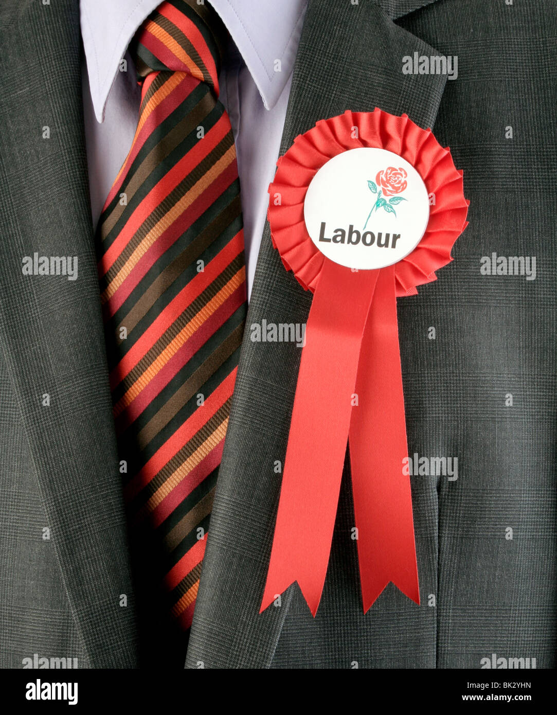 Red Labour Rosette pinned to Jacket Stock Photo - Alamy