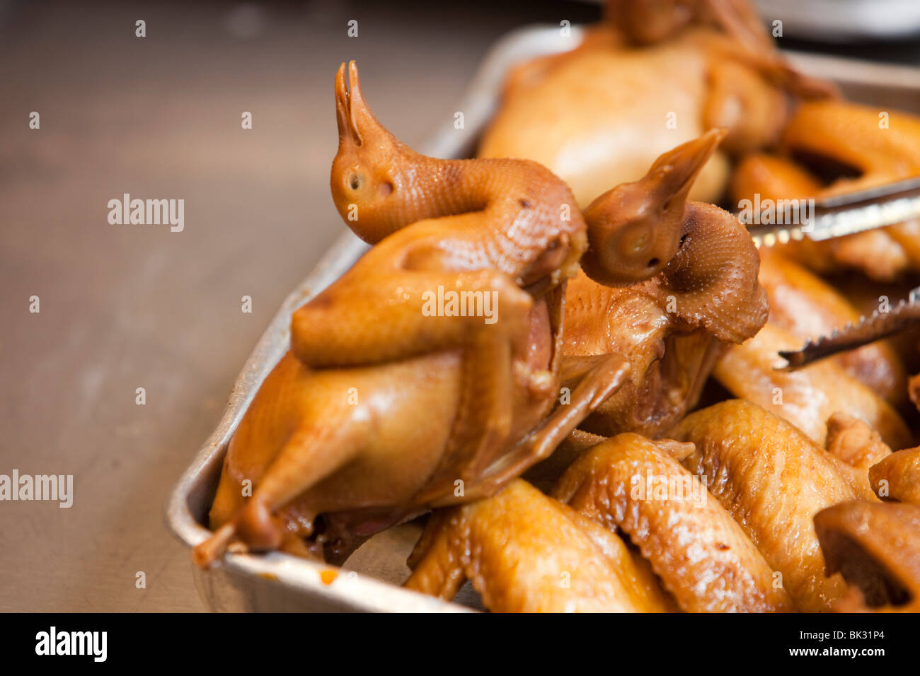 Young chickens on a street food stall in Kowloon, Hong Kong, China ...