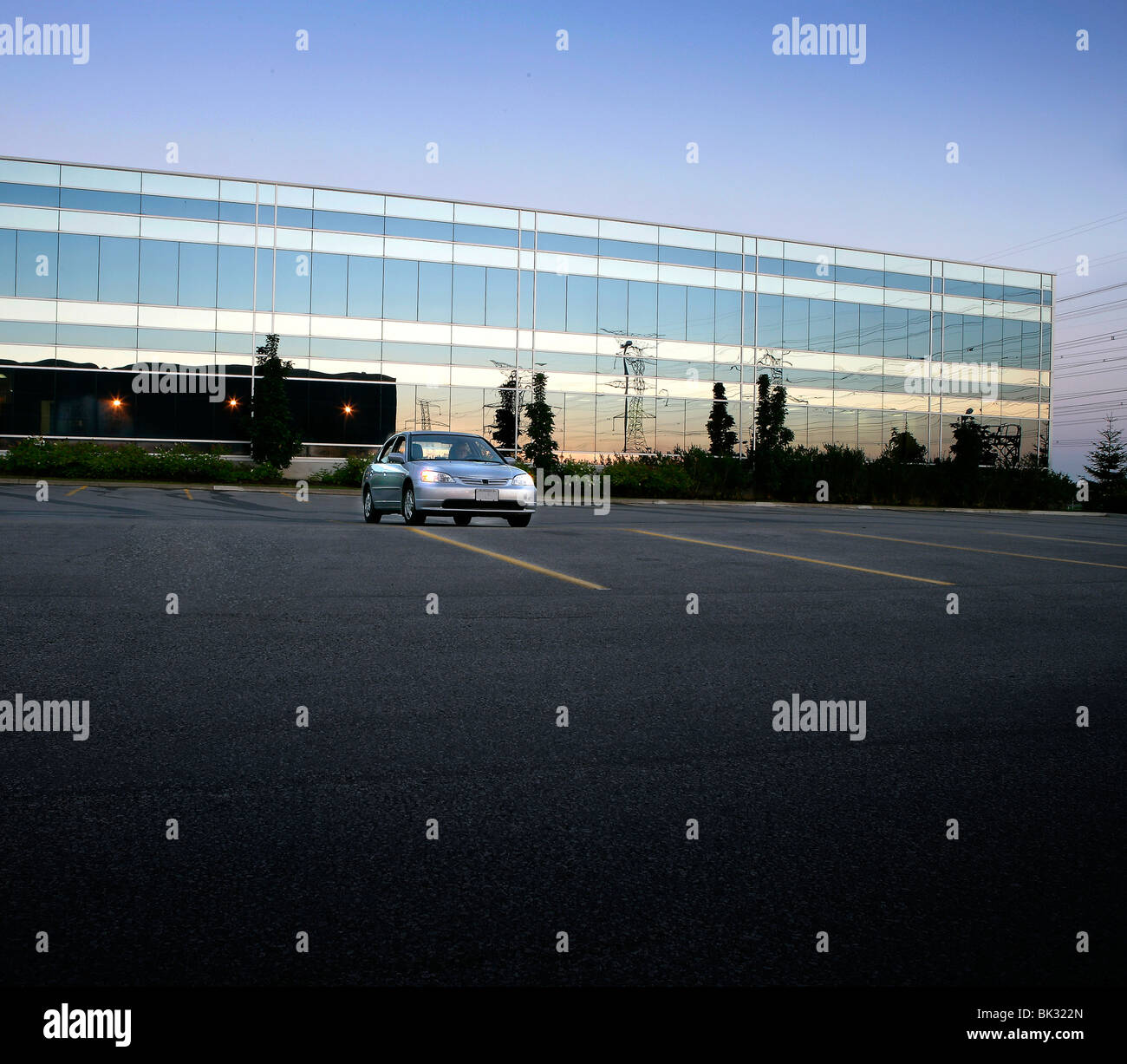 single car in parking lot Stock Photo - Alamy