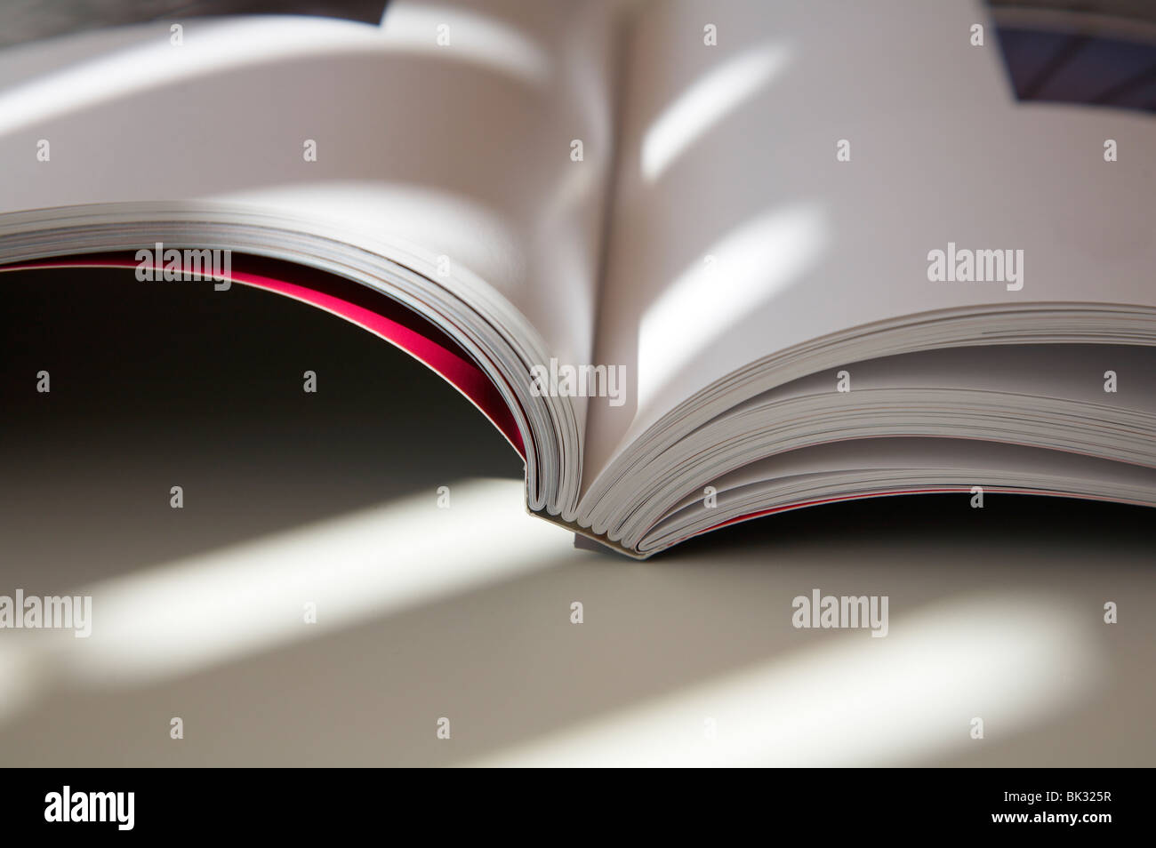 White book shadow hi-res stock photography and images - Alamy