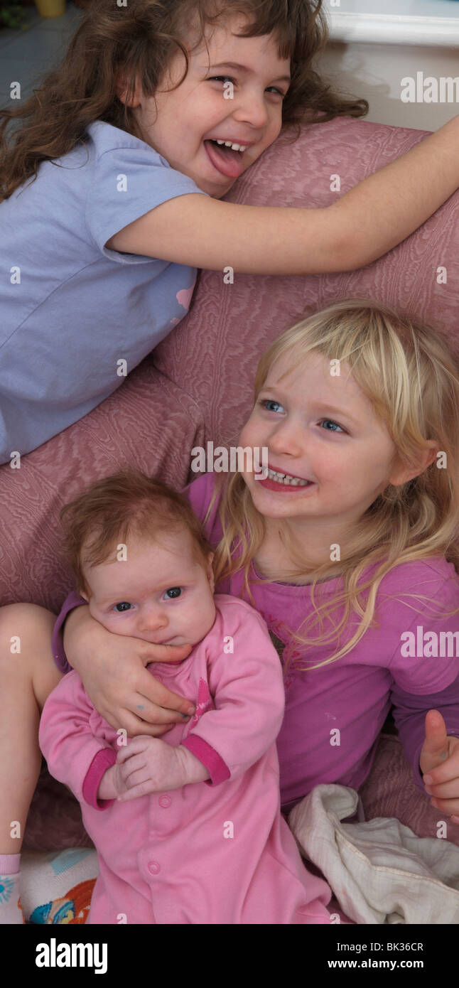 Three Sisters 6 And 4 Years Old And 2 Months Old Baby England Stock ...