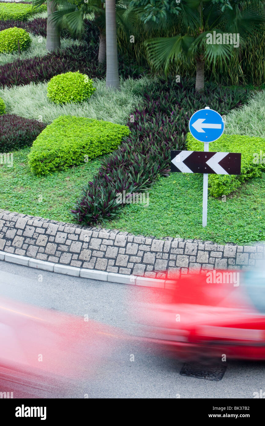 Taxi going round a roundabout in Hong Kong, China Stock Photo - Alamy