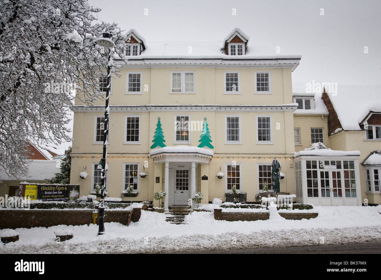 A snow covered hotel in Haslemere High Street, Surrey, England Stock ...