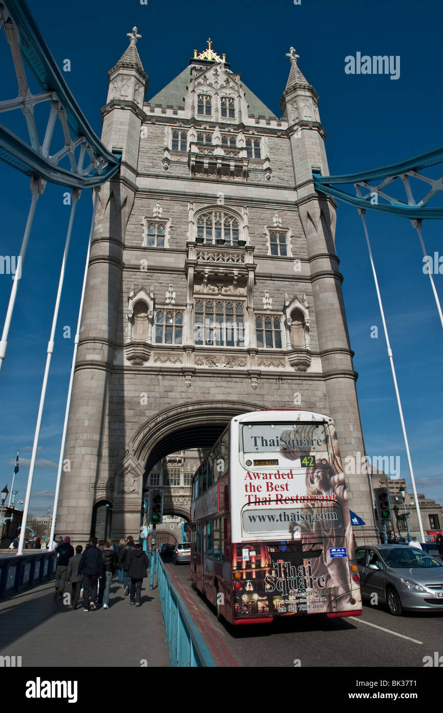 Bus crossing over the Tower Bridge of London Stock Photo - Alamy