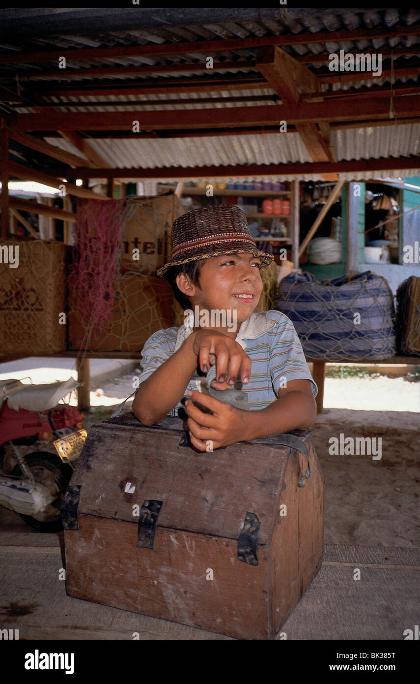 A shoeshine boy with his wooden box, San Ignacio, Belize, Central ...