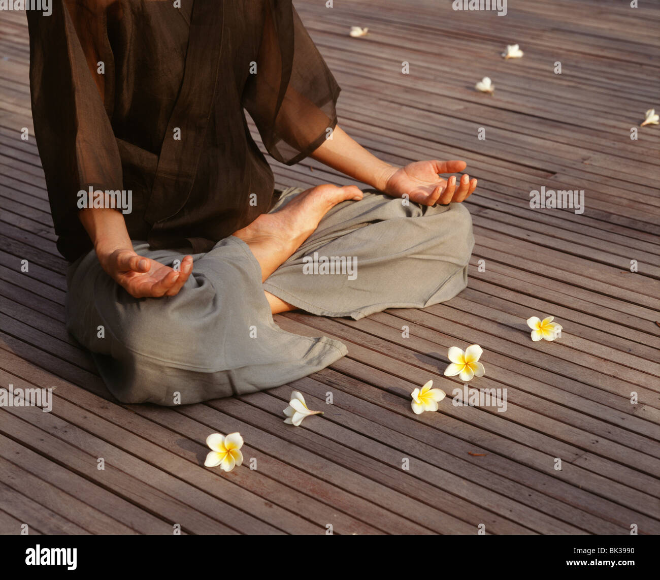 Meditation in lotus position Stock Photo - Alamy