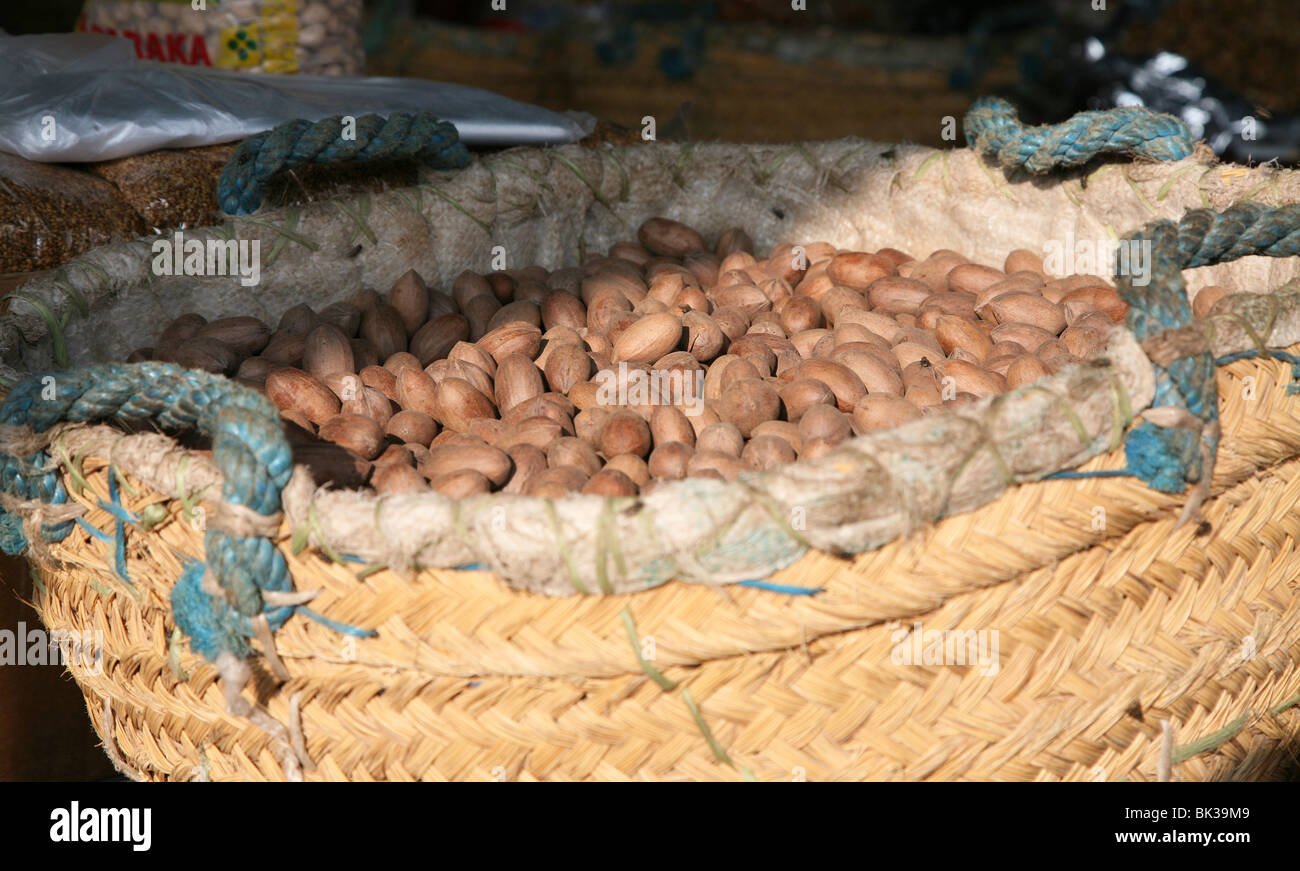 Nutmeg nuts in a basket for sale at a Tunis market, Tunisia, North ...