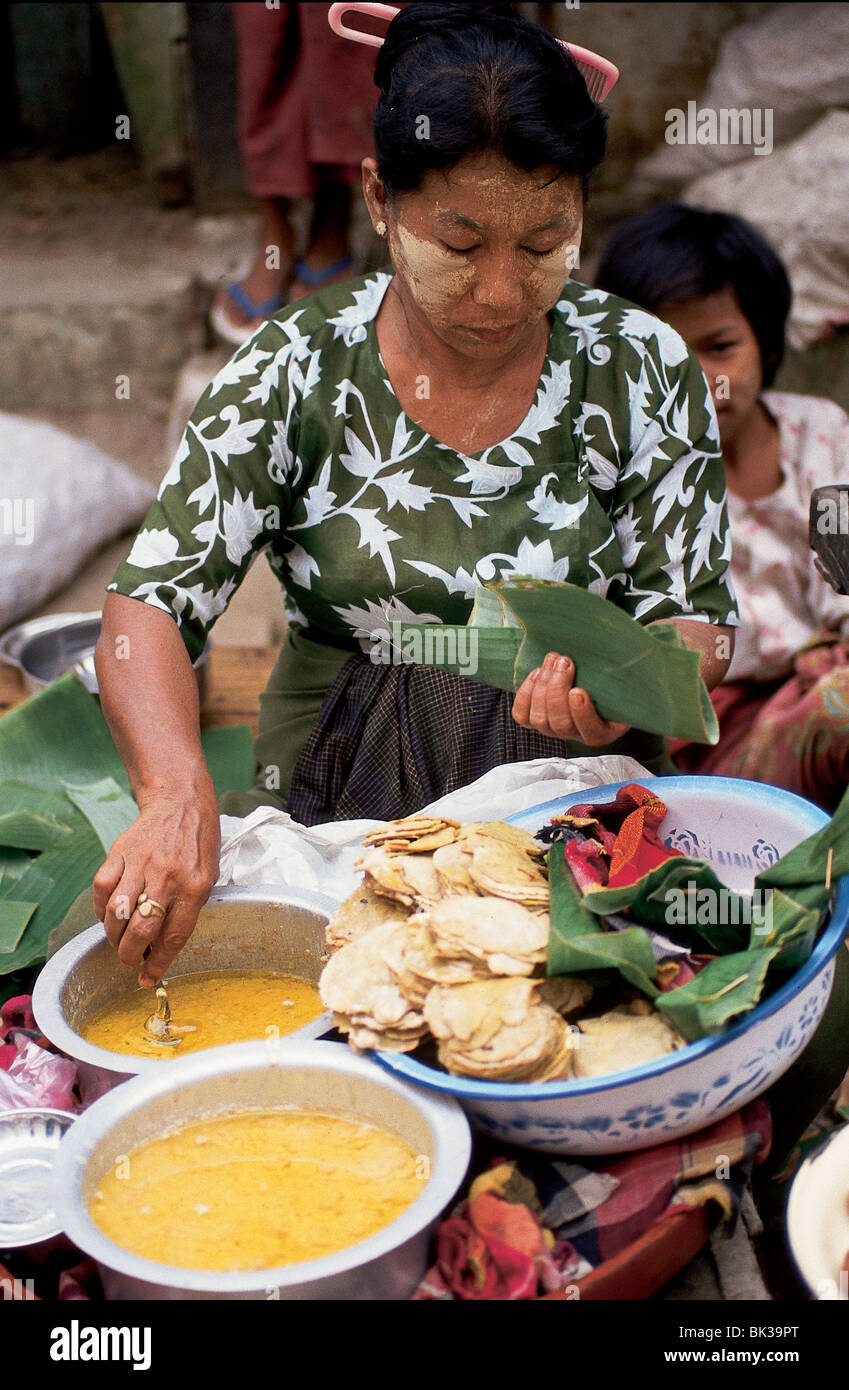 Woman preparing food, Myanmar Stock Photo - Alamy