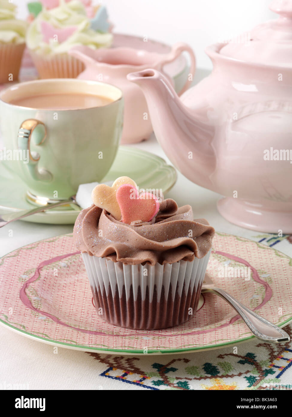 Chocolate cupcake in an afternoon tea setting Stock Photo - Alamy