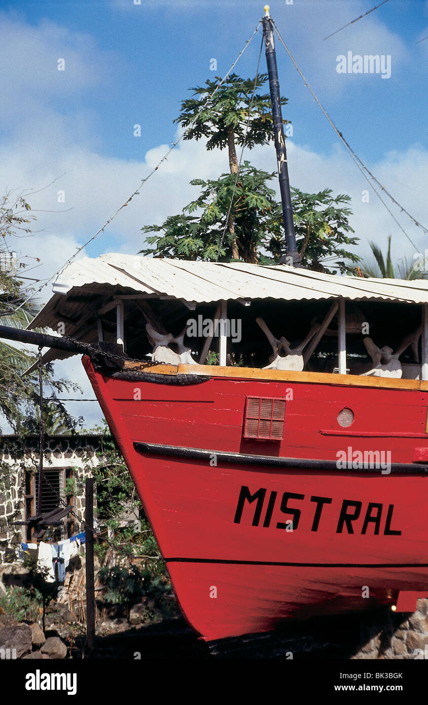 Bow of a wood ship or ferryboat, dry docked, and painted red with the ...