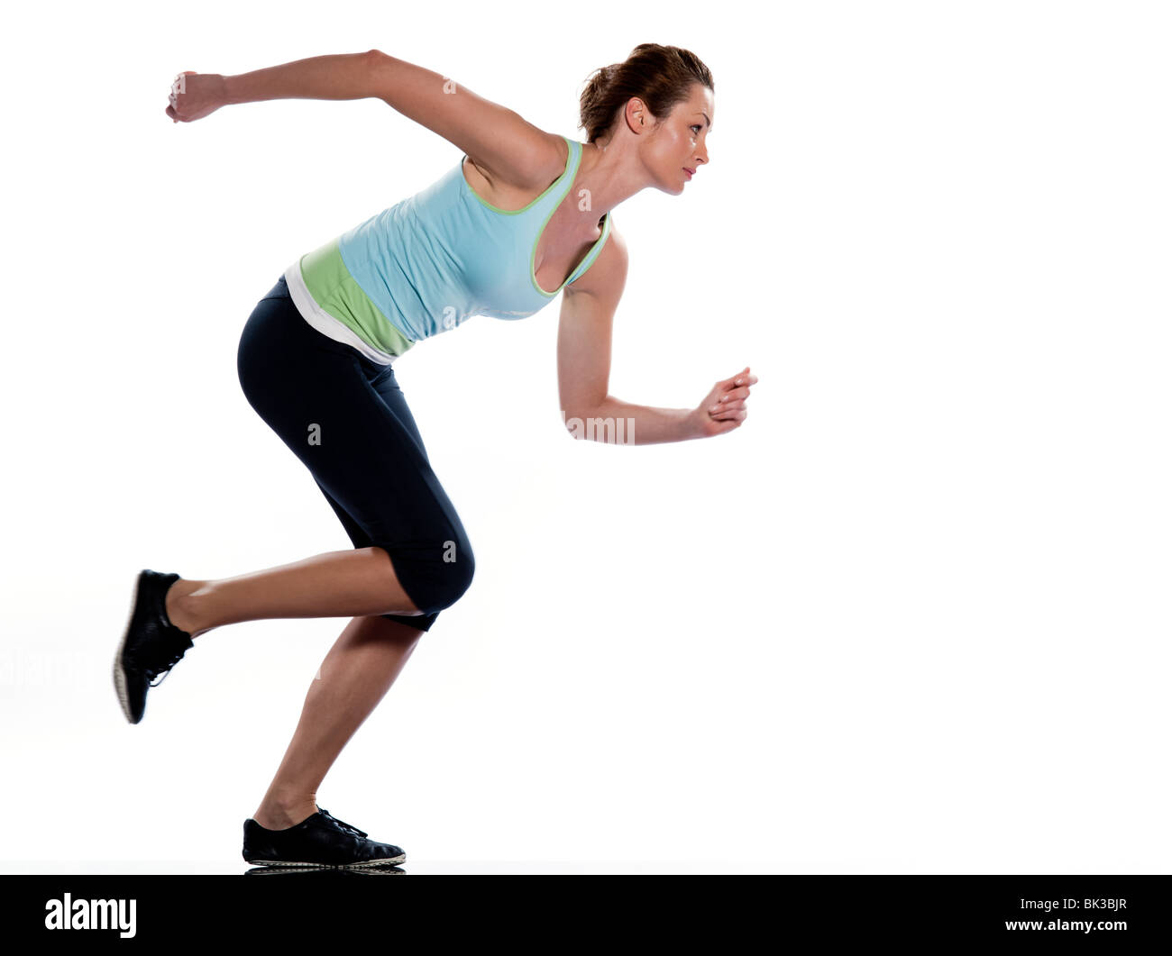 woman running on studio white isolated background Stock Photo - Alamy
