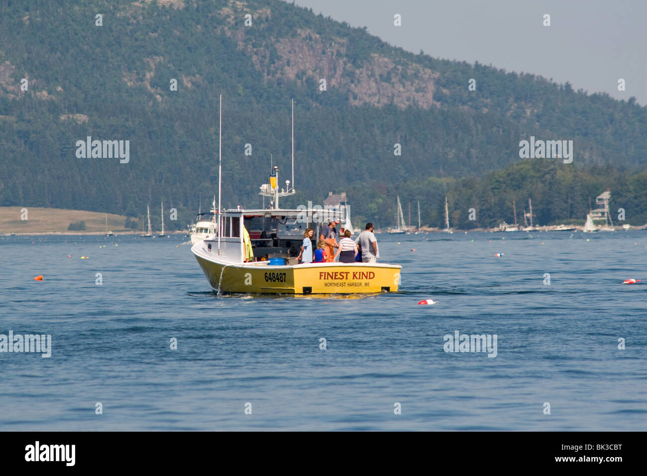 Family lobstering lessons Stock Photo - Alamy