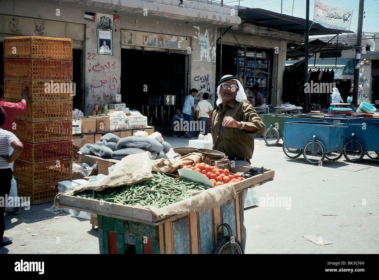 Jordanian vendor at a vegetable stand in Amman, Jordan Stock Photo - Alamy