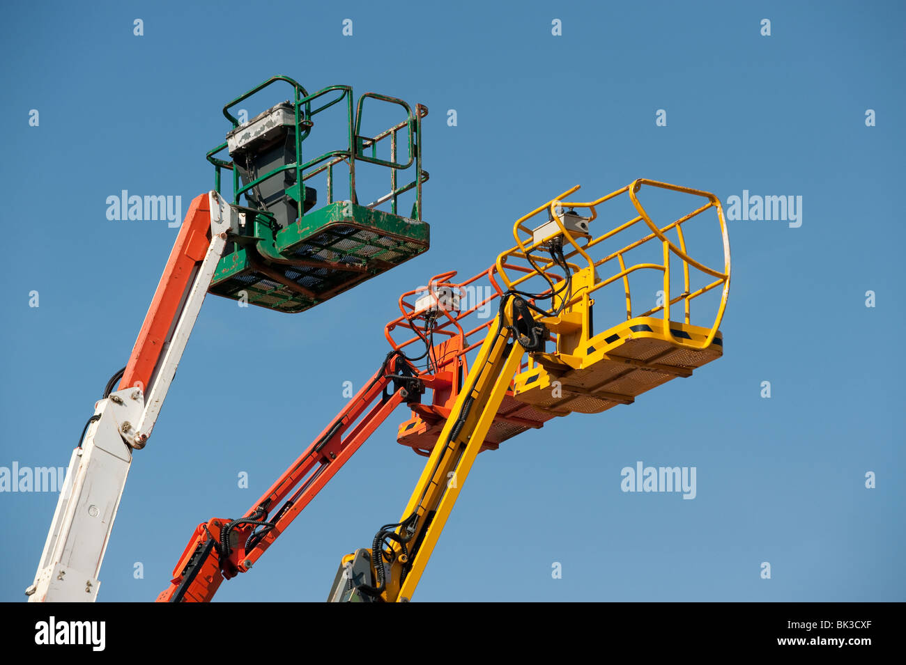 Hydraulic Platform cages against blue sky Stock Photo - Alamy