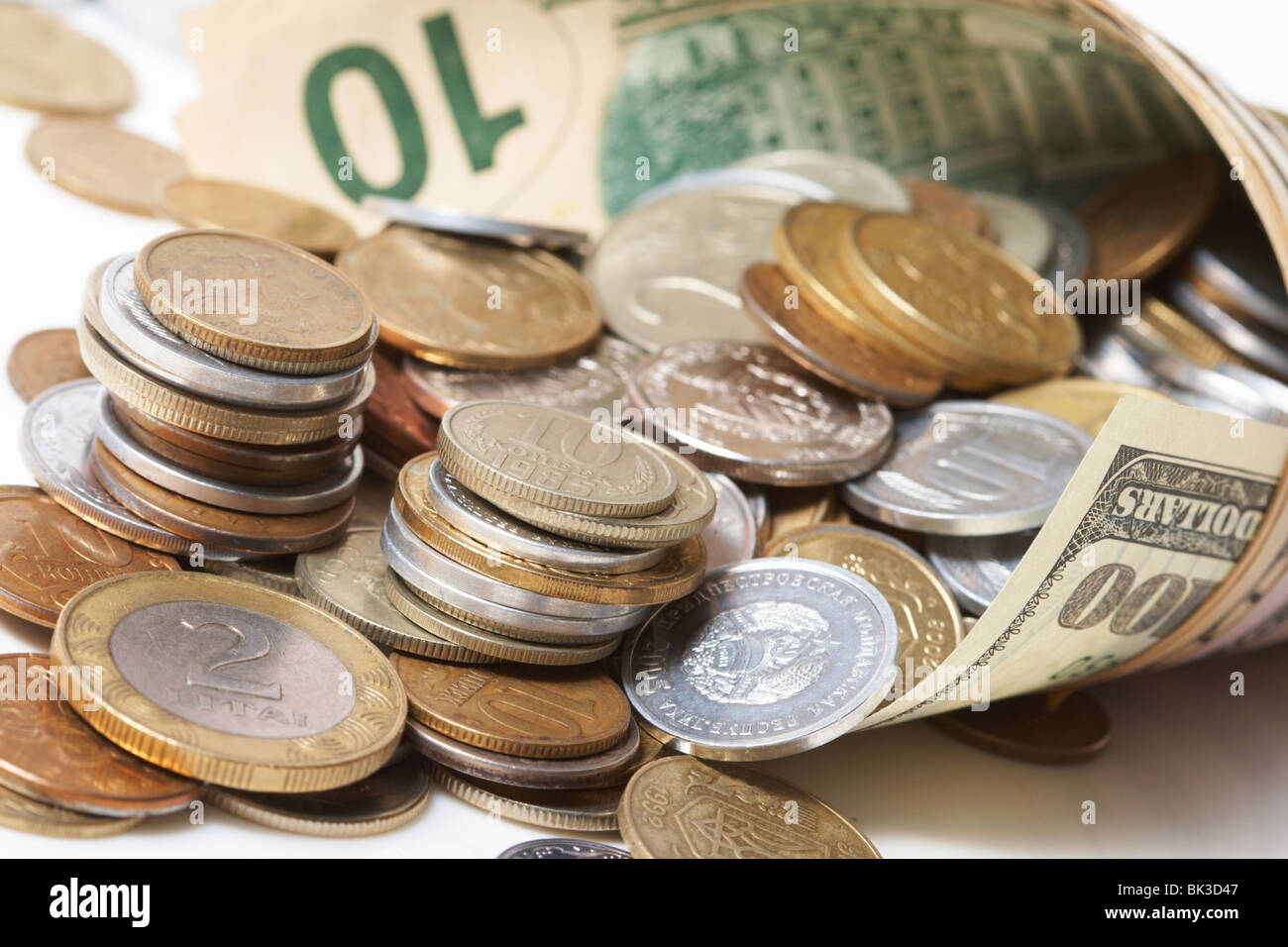 horn from dollar denominations with fine coins Stock Photo - Alamy