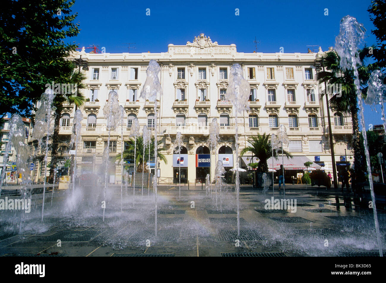 Refreshing water jet in the Place de Gaulle of Antibes Stock Photo - Alamy
