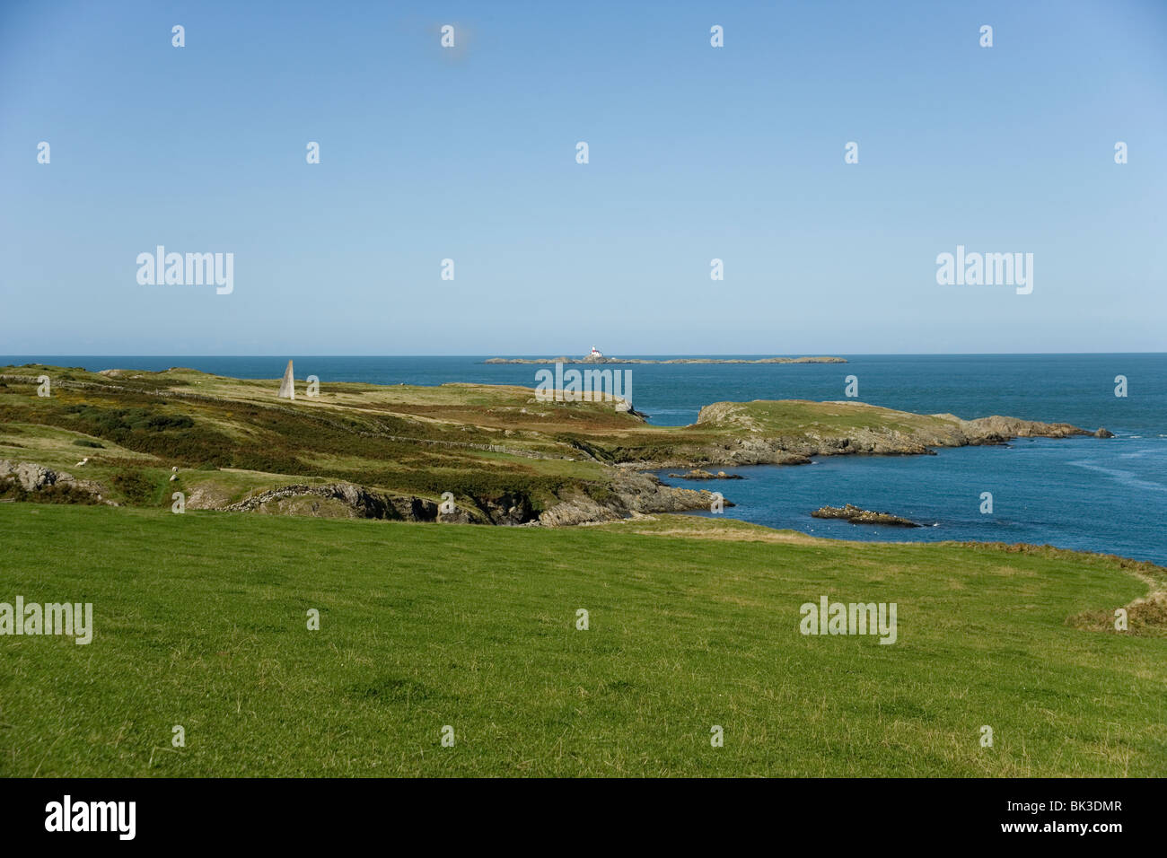 Skerries Lighthouse and Carmel Head from the Anglesey coastal path ...