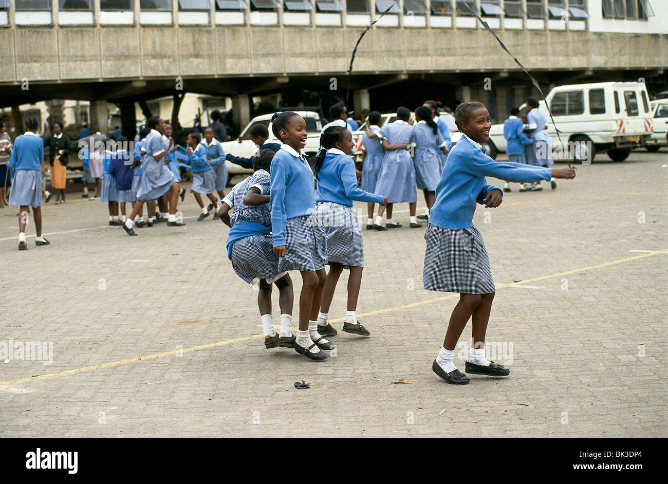 Kenyan school children jumping rope, Nairobi, Kenya Stock Photo - Alamy
