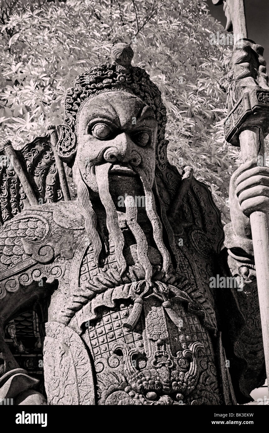 Giant Stone Statue - Wat Po, Bangkok Stock Photo - Alamy