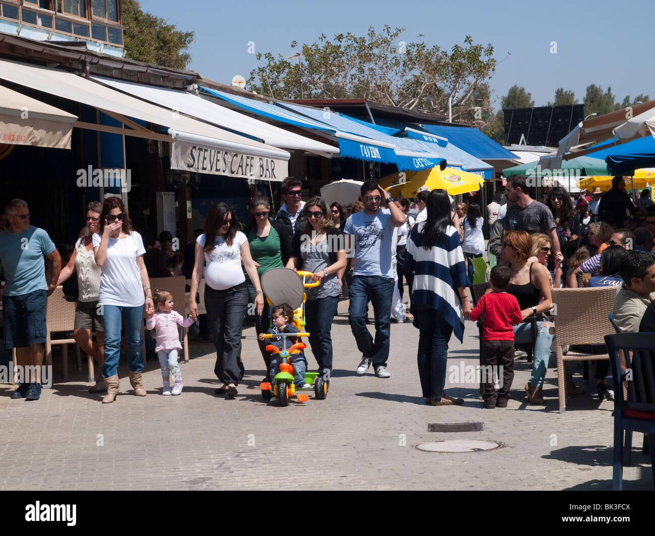 People walking around the busy Harbour area in Paphos, Cyprus Europe ...
