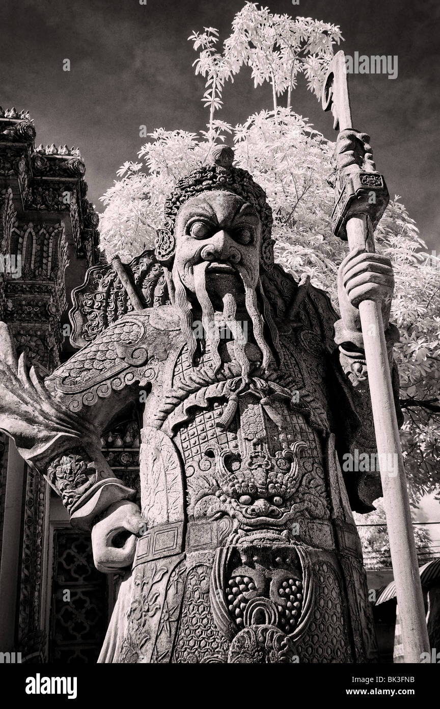 Giant Stone Statue - Wat Po, Bangkok Stock Photo - Alamy