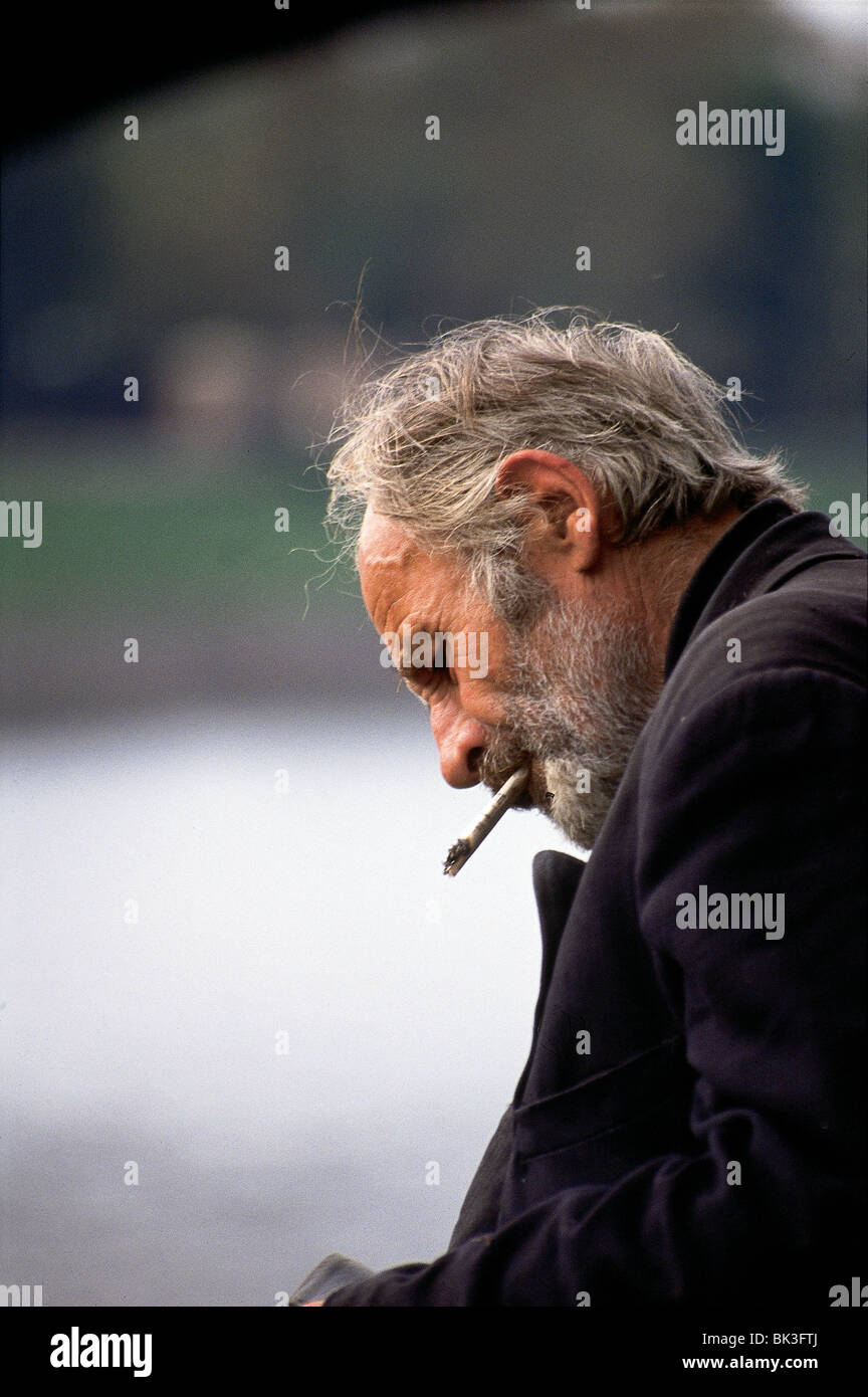Man smoking a cigarette, Russia Stock Photo - Alamy