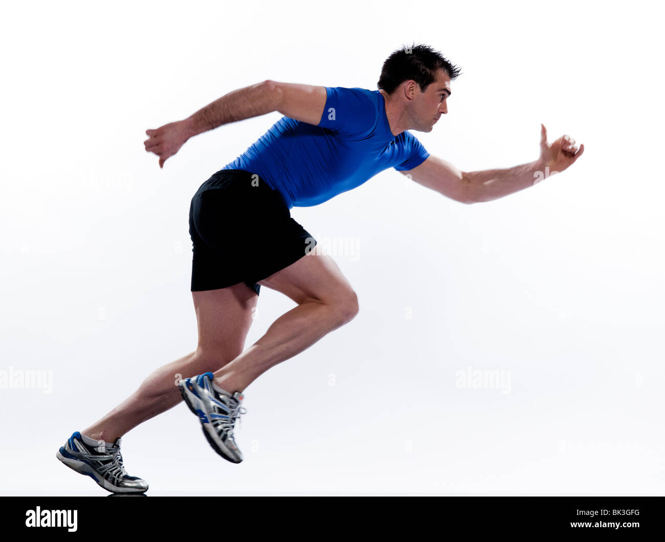 man profile running sprinting full length on studio white isolated ...