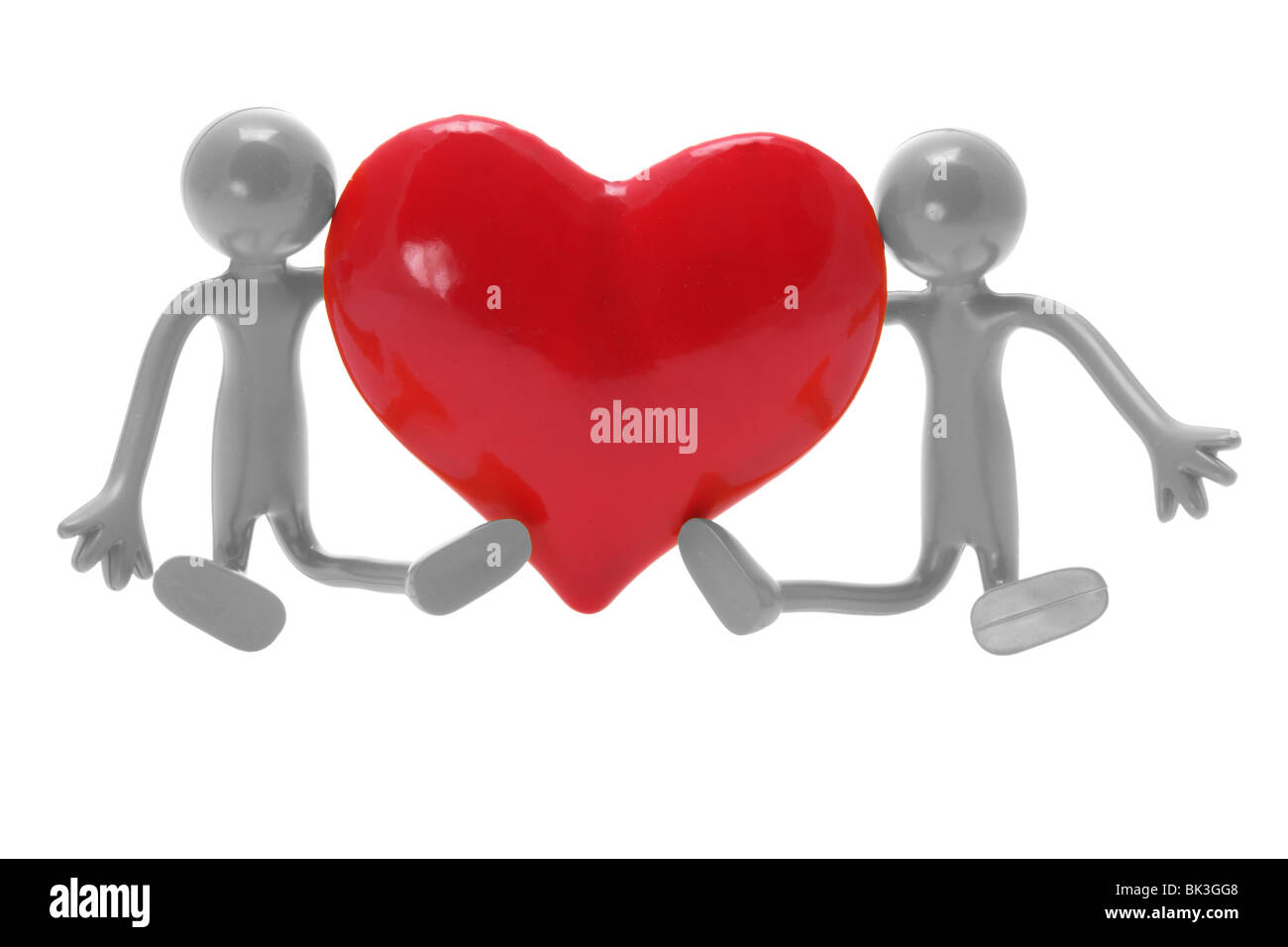 Miniature Rubber Figures with Love Heart Stock Photo - Alamy
