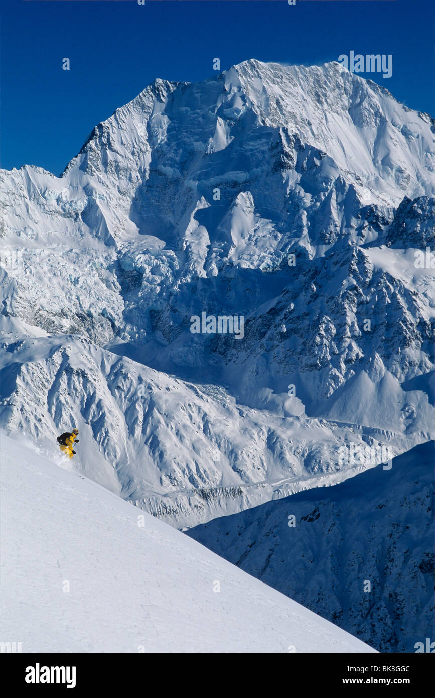 Helicopter skiing below 12,349' Mount Cook; highest mountain in New ...