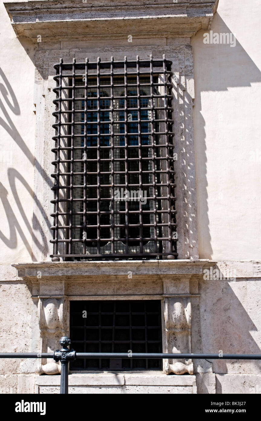 A well protected old window surrounded by a thick iron lattice, Rome ...