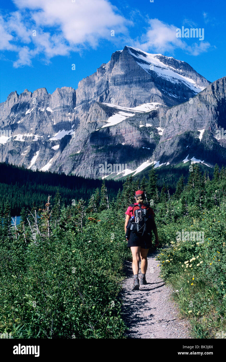 Hiking on Grinnell Glacier Trail below Mount Gould in the Many Glacier ...