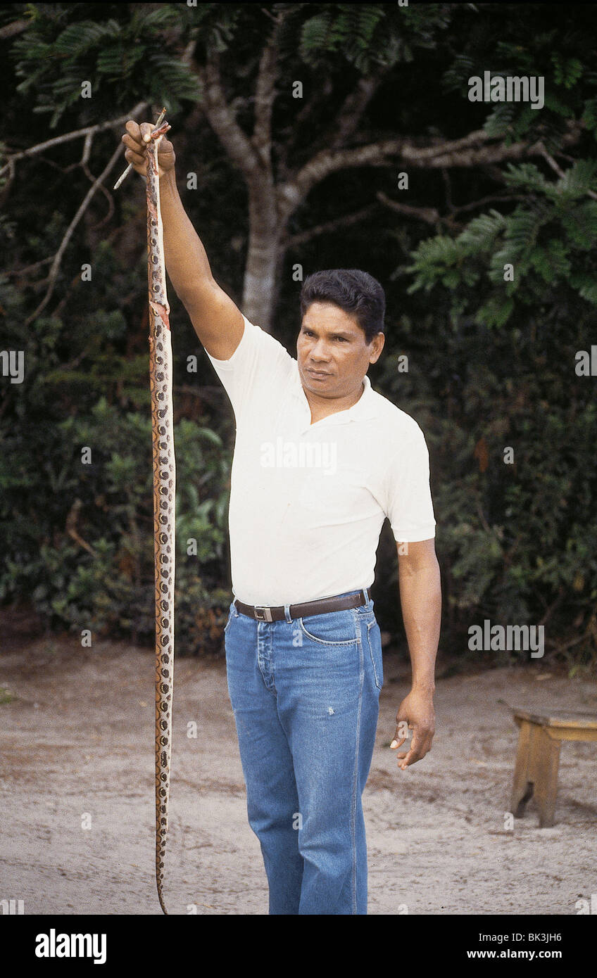 Man holding snakes hi-res stock photography and images - Alamy