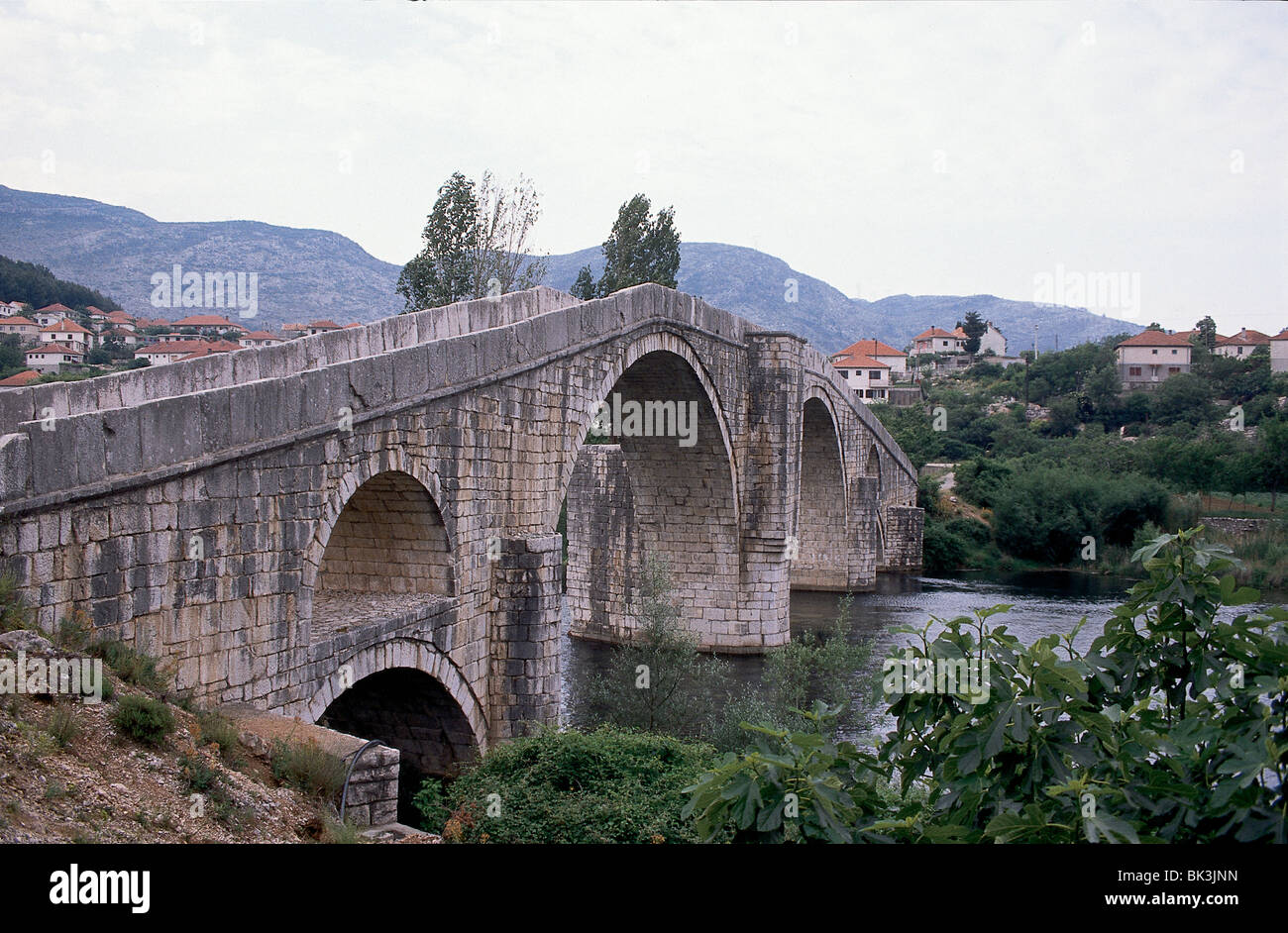 A historic multiple arch bridge over a river near Dubrovnik, Croatia ...