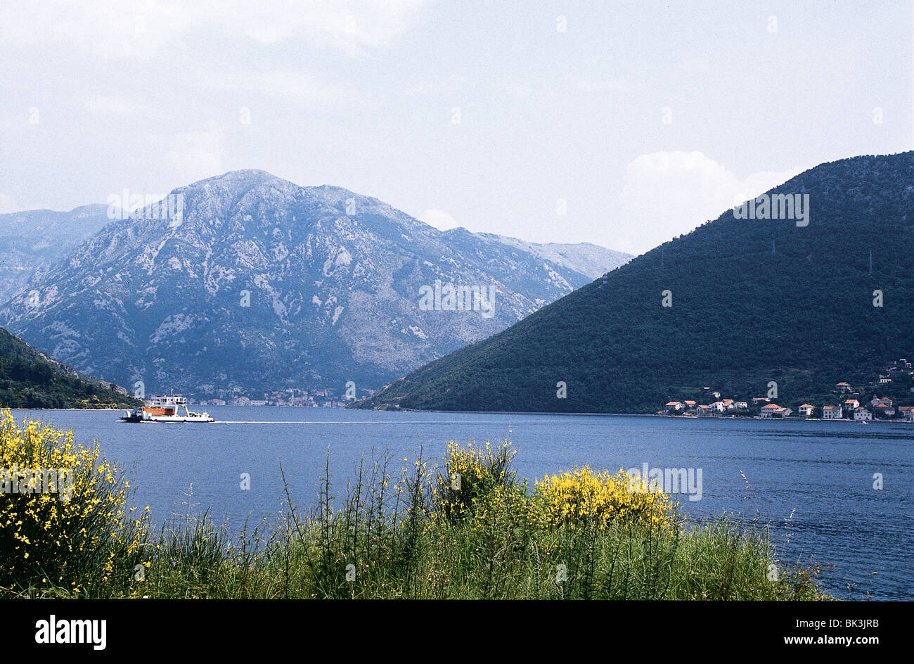 Landscape and a small ferry boat on Adriatic Sea along the Dalmatian ...