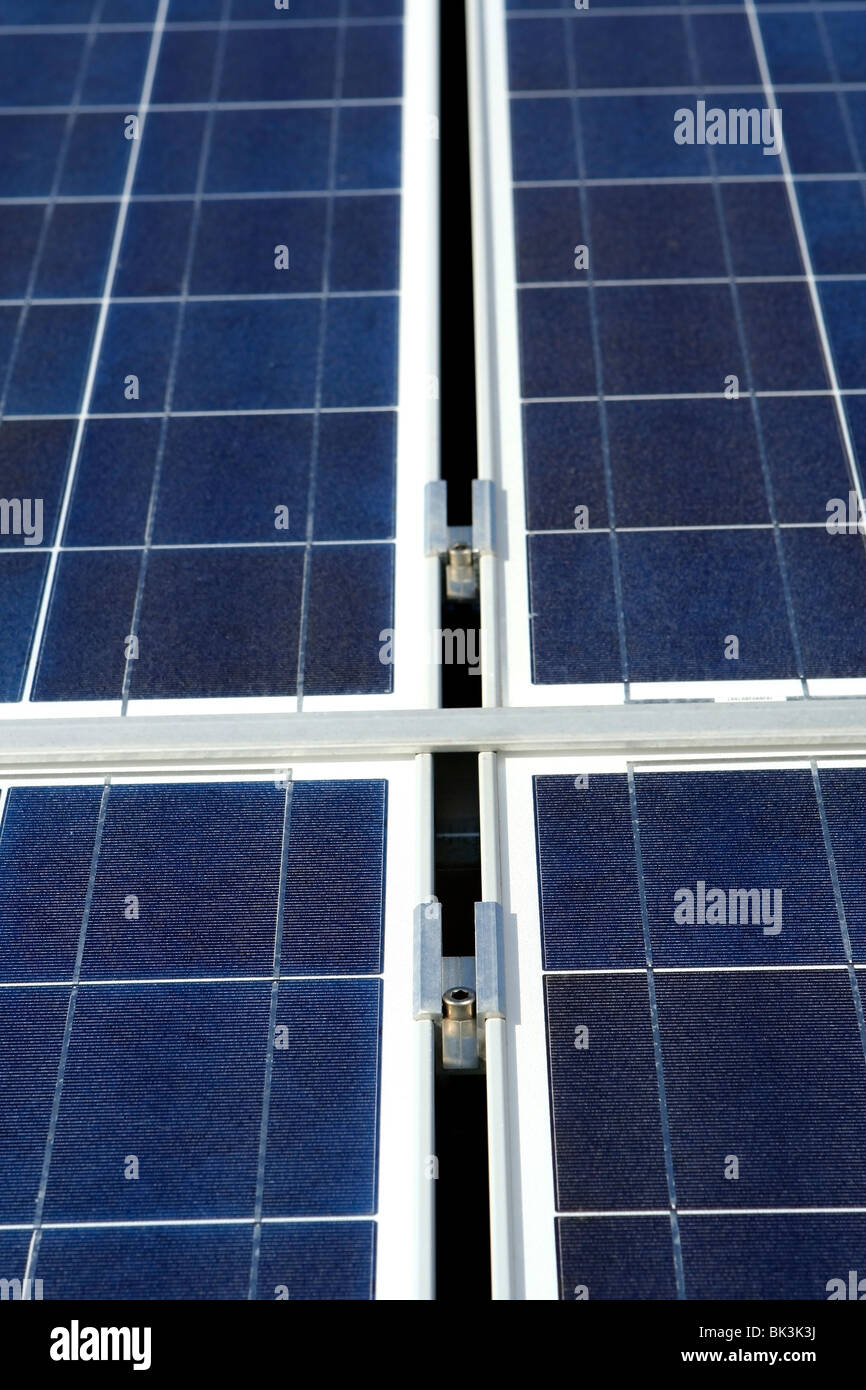 Modern solar photo voltaic panels with great blue cells with ...