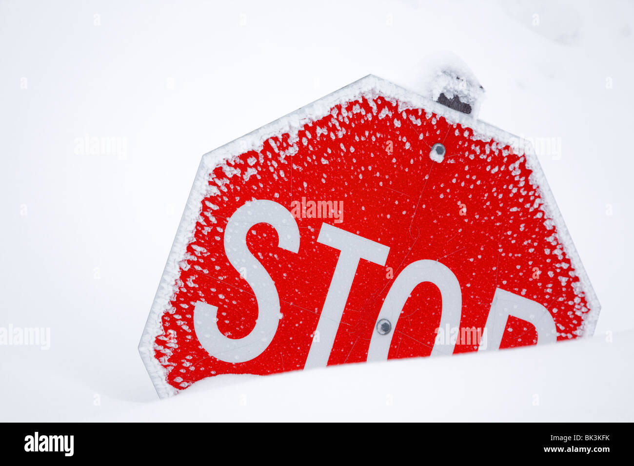 Stop sign buried hi-res stock photography and images - Alamy