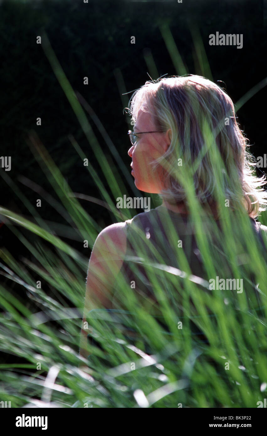 Woman reflective anonymous hi-res stock photography and images - Alamy
