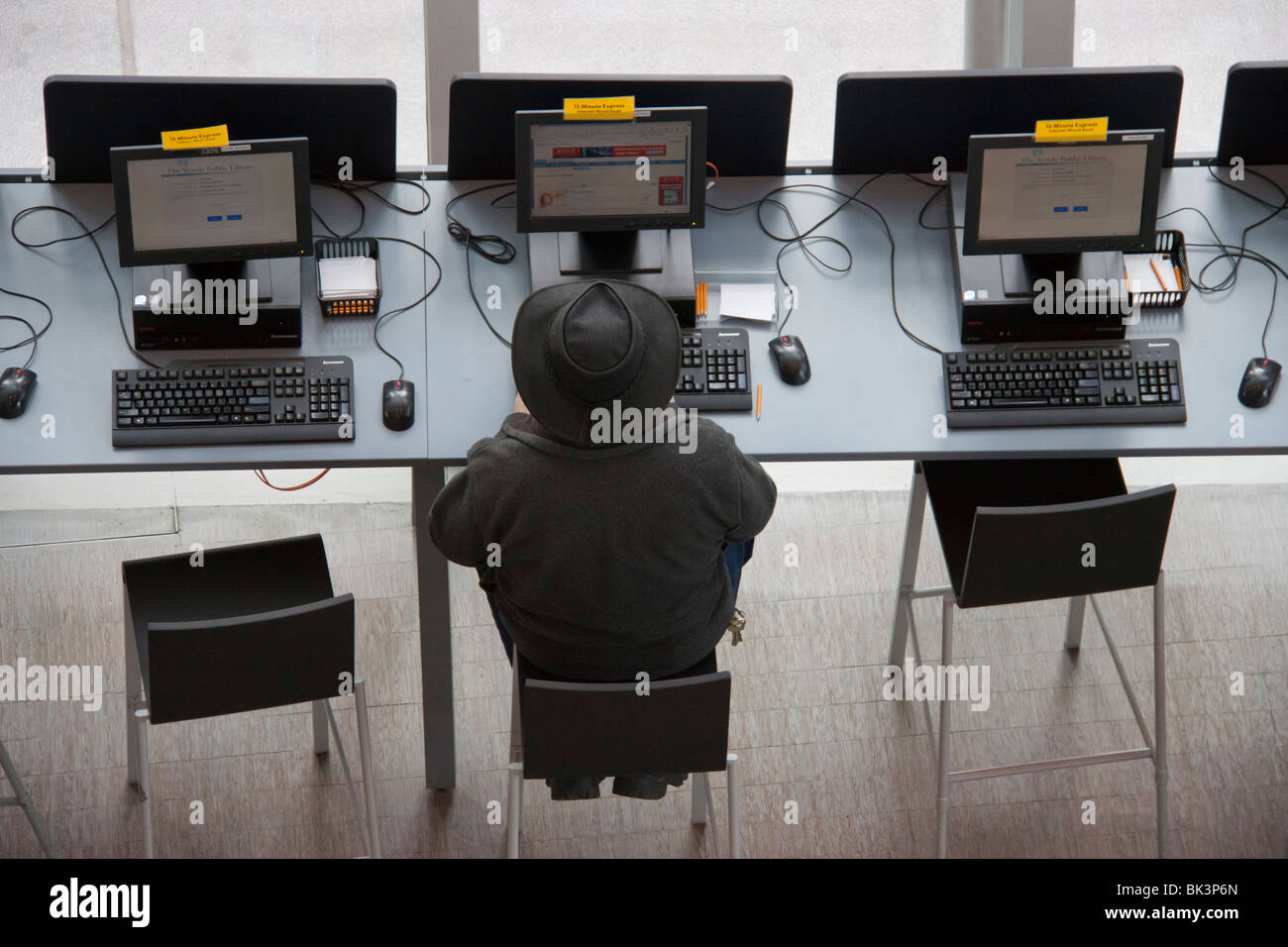 Man using computer at main branch, Seattle Public Library, Seattle ...