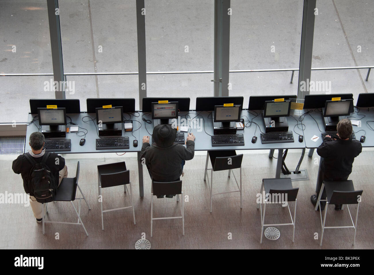 Men using computers at main branch, Seattle Public Library, Seattle ...