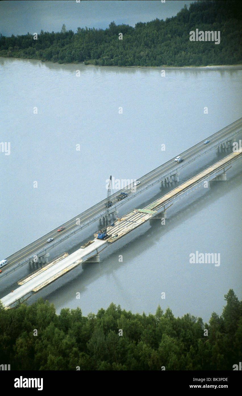 Aerial view of an interstate highway bridge and construction crane in ...